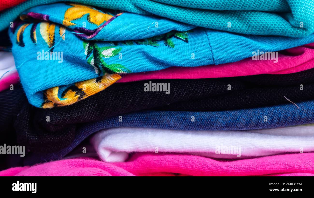 pile of clothes as background Stock Photo - Alamy