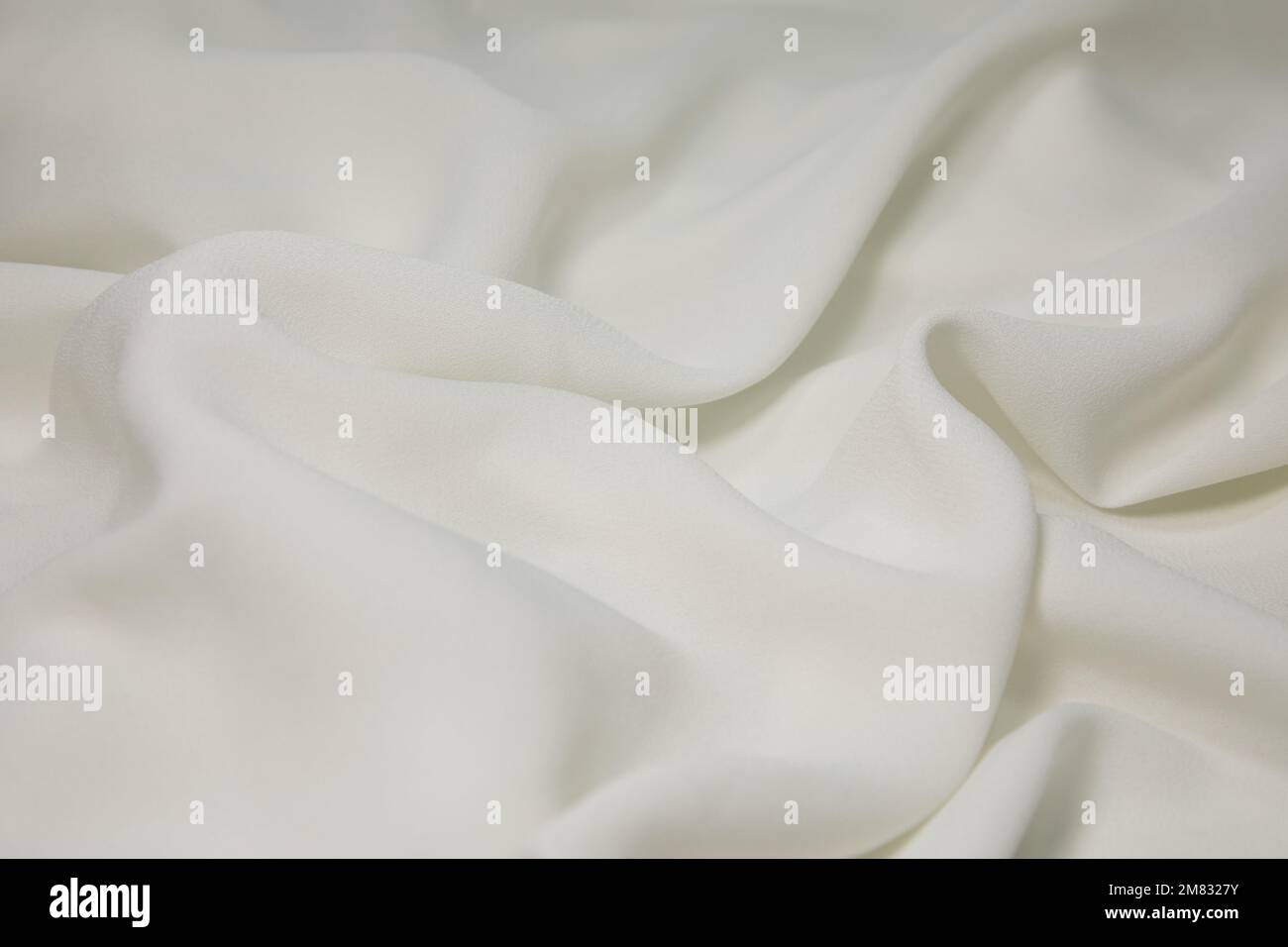 White fabric background. White cloth waves background texture. White ...