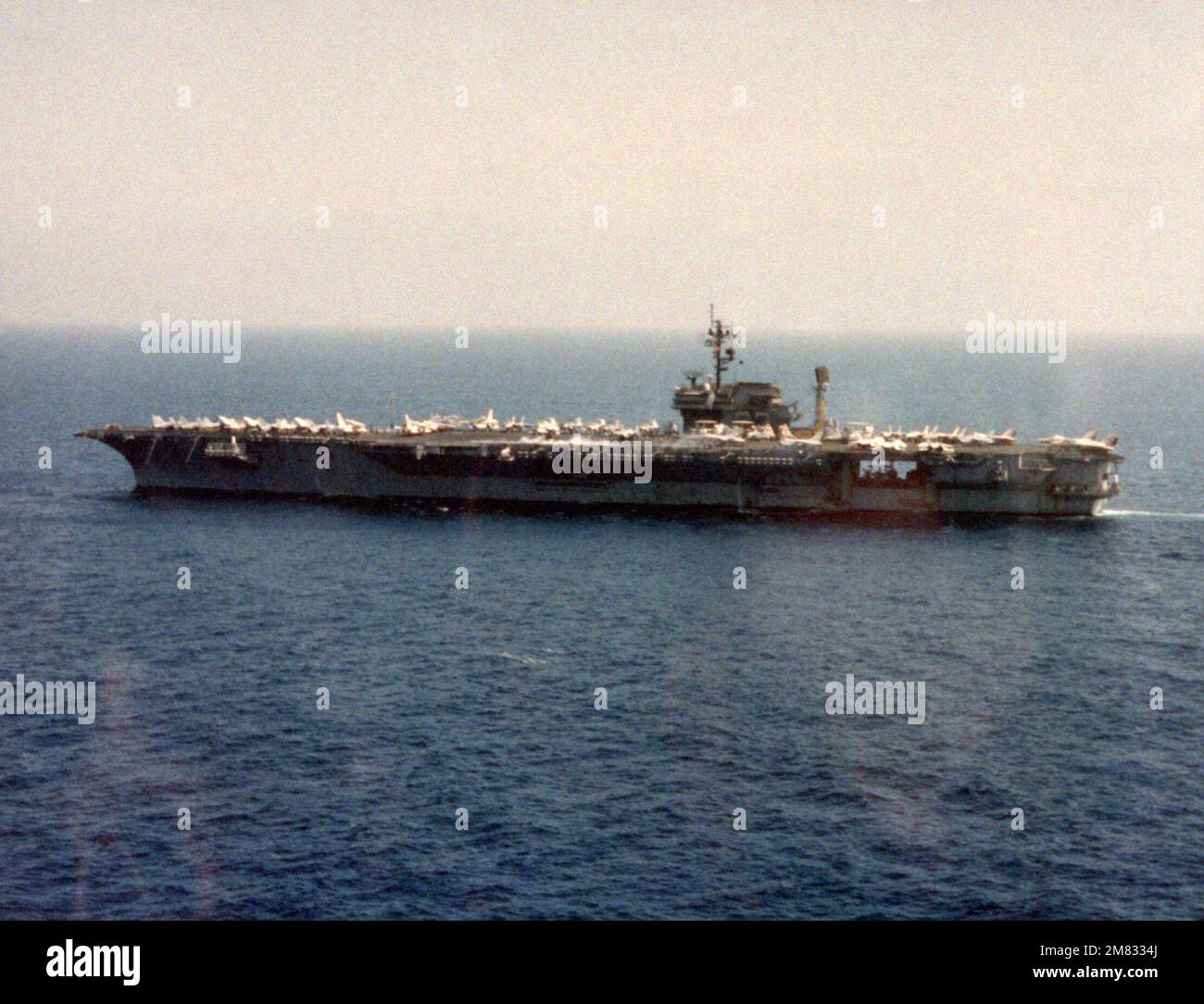 Aerial port beam view of the aircraft carrier USS KITTY HAWK (CV 63 ...