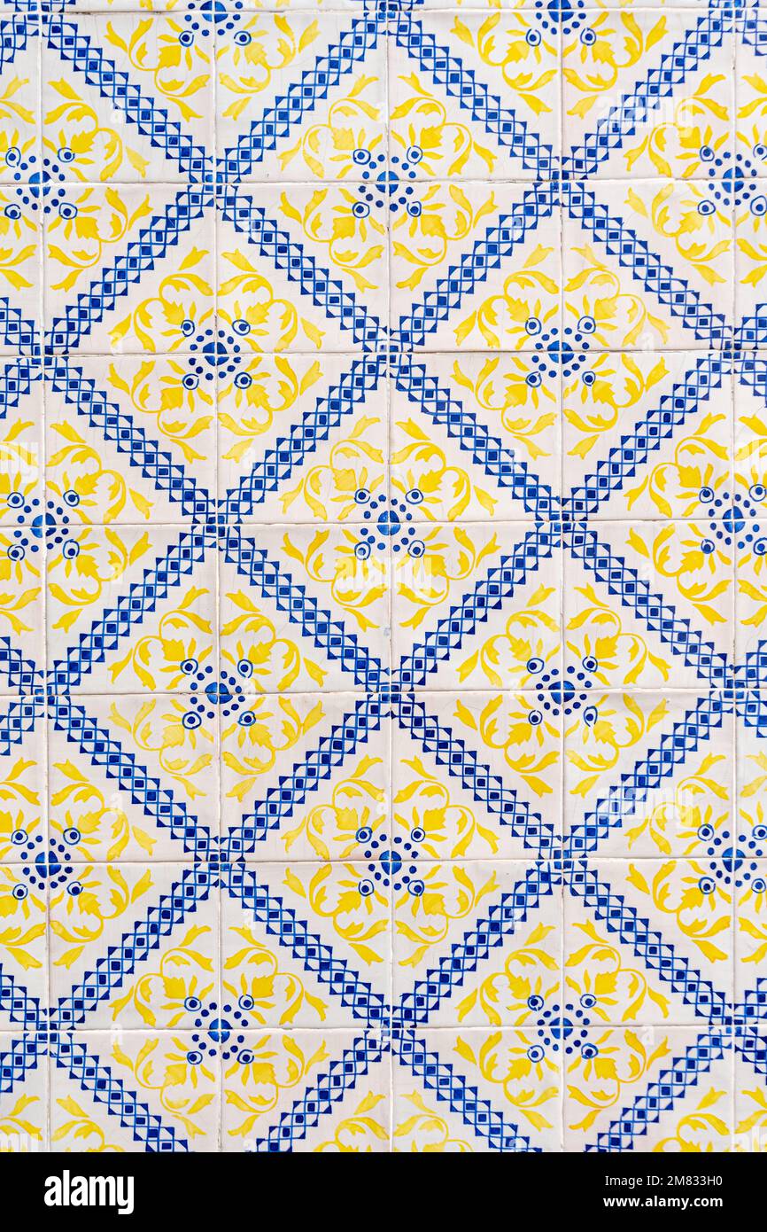 Traditional portuguese blue and yellow tile Azulejo Stock Photo - Alamy