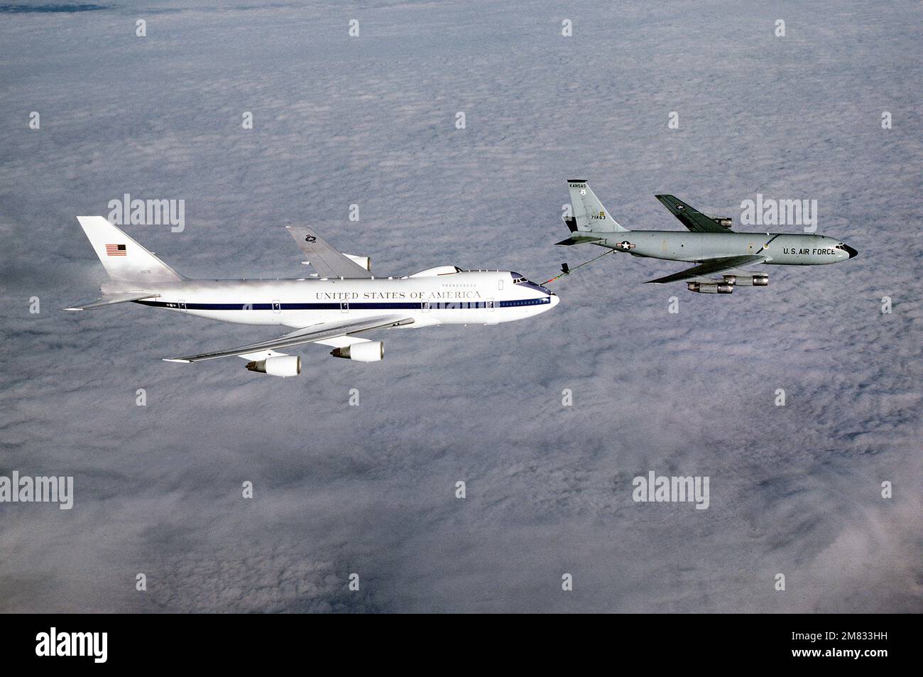 An air-to-air right side view of an E-4B advanced airborne national c ...