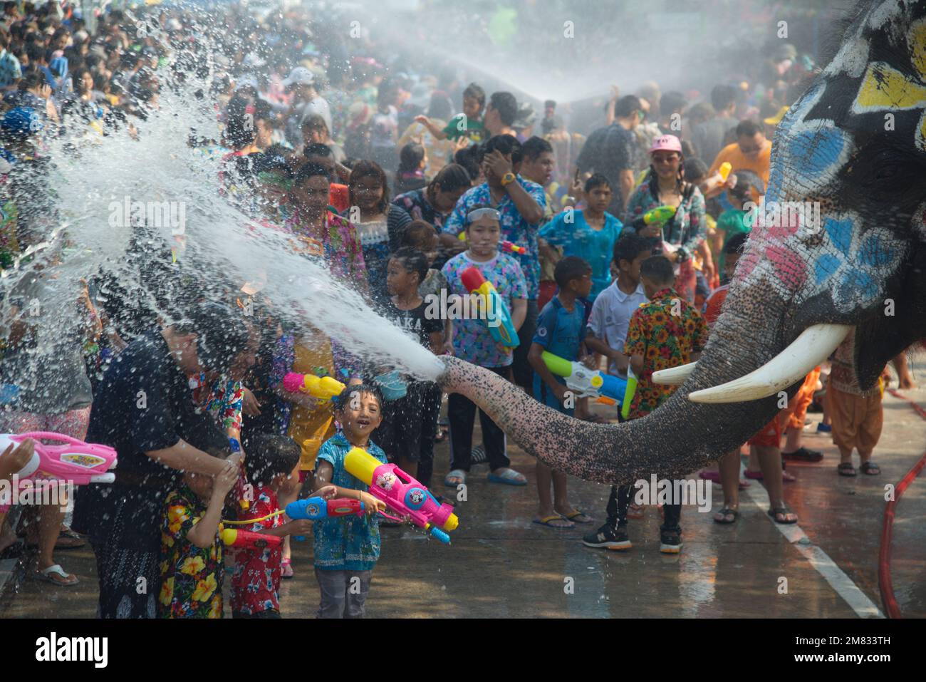 Thai people and traveler join with Songkran Festival is celebrated in a traditional New Year's ...