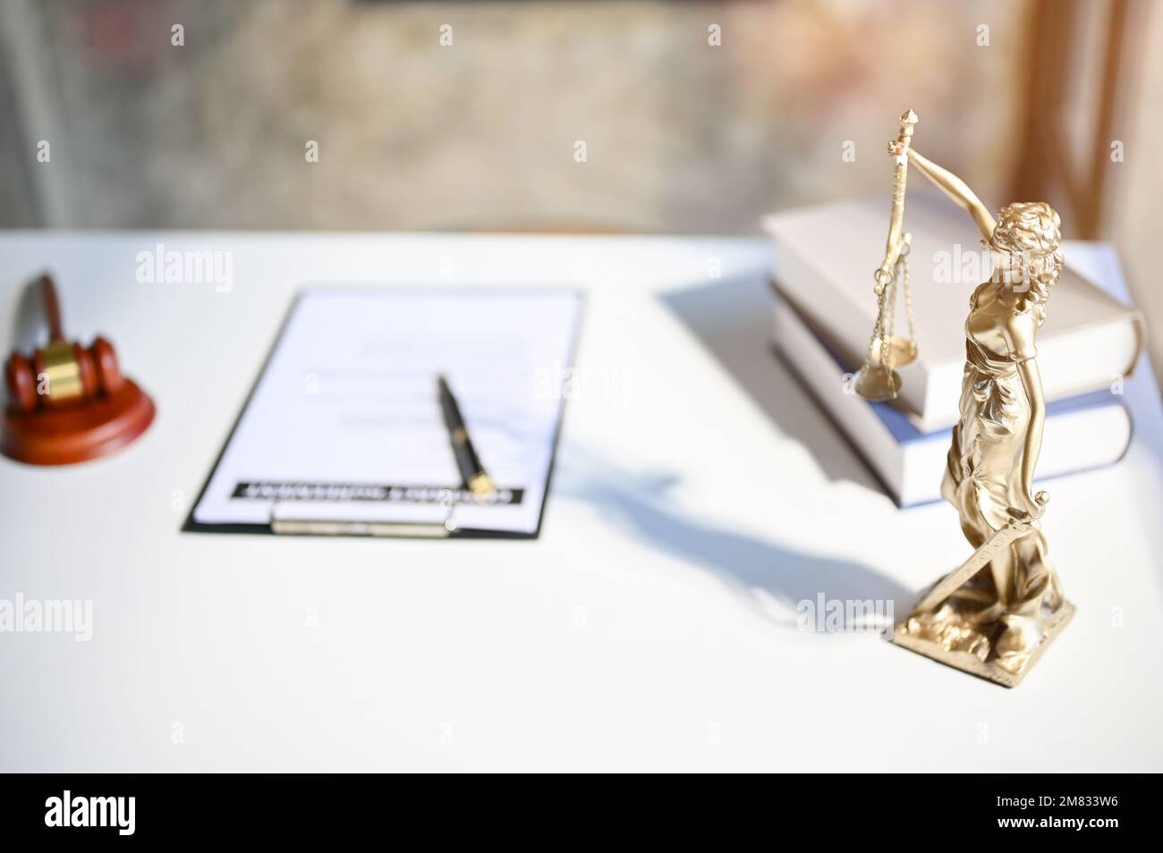 Lady justice statue law table hi-res stock photography and images - Alamy
