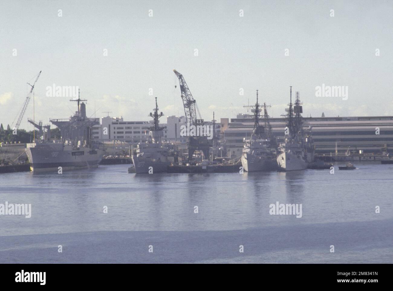 Bow views of various U.S. Navy ships moored at Bravo Piers. The ships ...