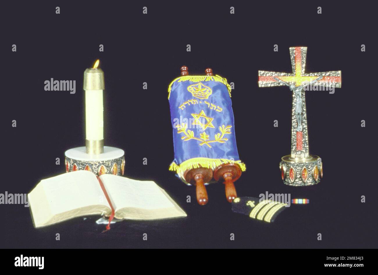 Religious articles of the Christian and Jewish faiths are assembled for ...