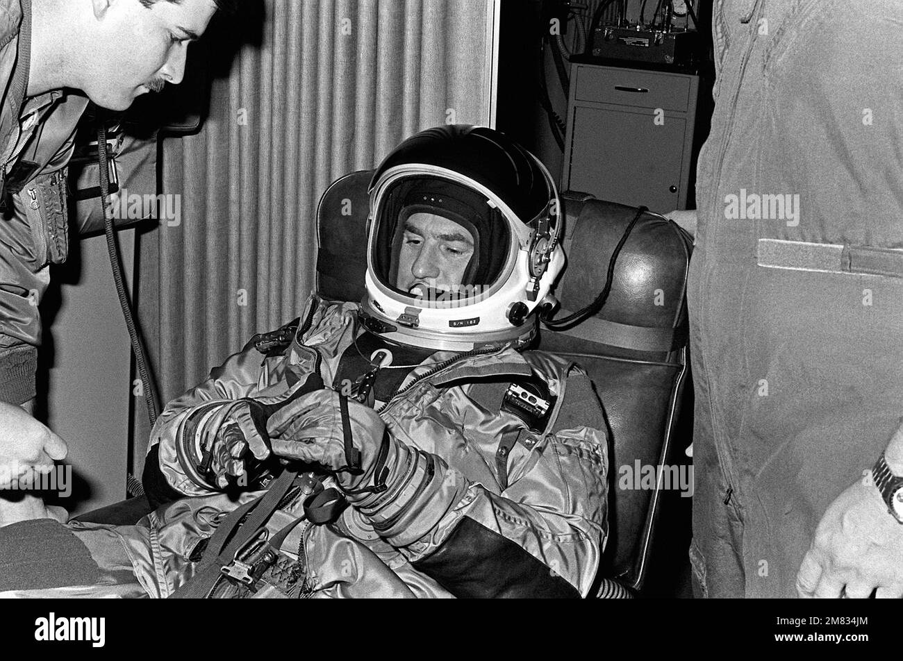 Captain William D. Stanford helps Craig Nelson with the controls on his ...