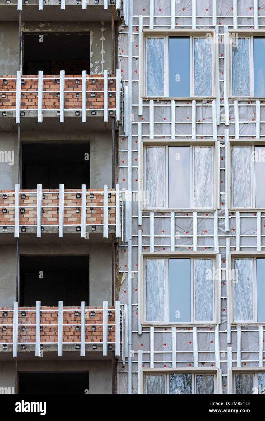 exterior house wall heat insulation with mineral wool. building under ...