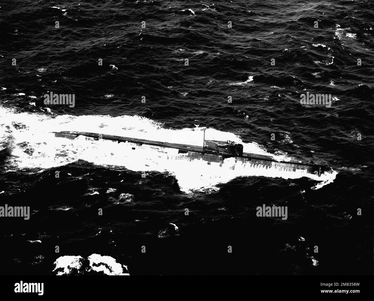A aerial view of a Modified Echo II class Soviet submarine underway ...