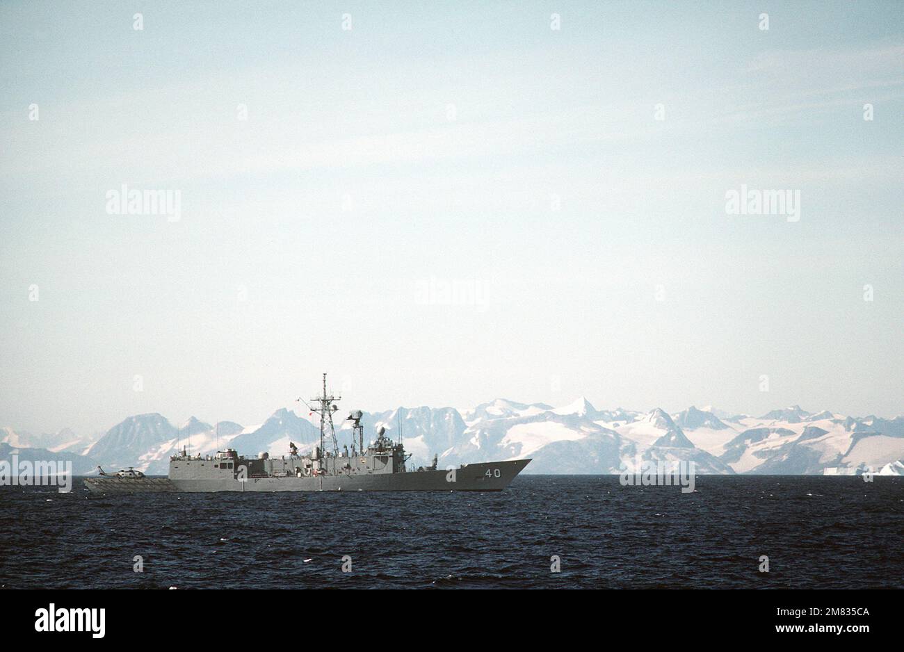 A starboard beam view of the guided missile frigate USS HALYBURTON (FFG ...