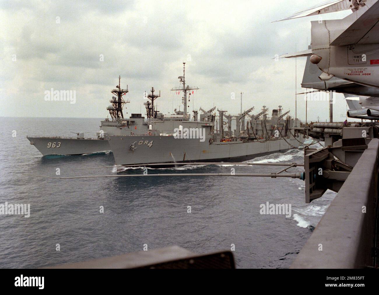 A port bow view of the fleet oiler USS SAVANNAH (AOR-4) and the ...