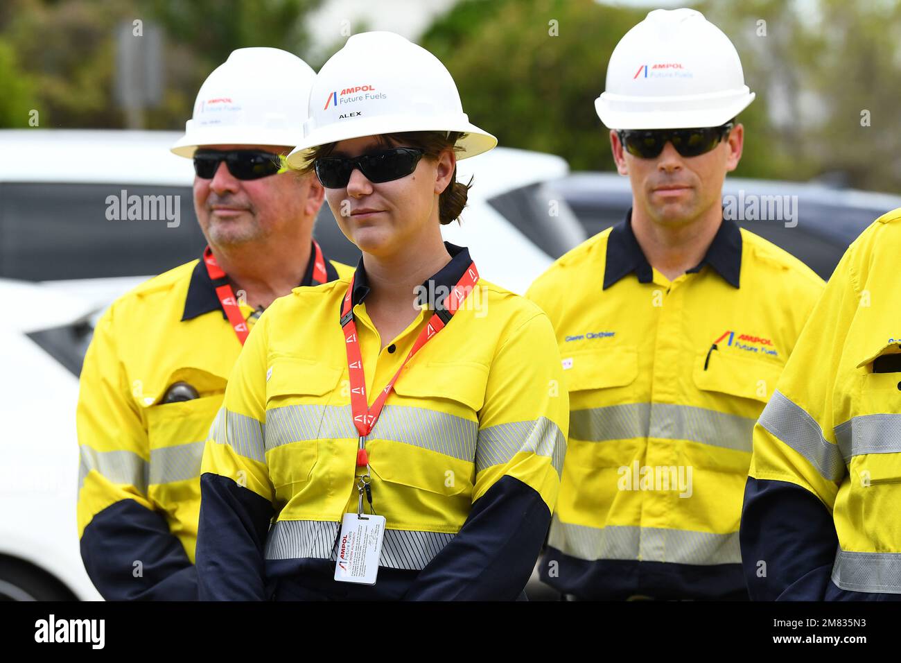 AMPOL employees look on as Acting Queensland Premier Steven Miles ...