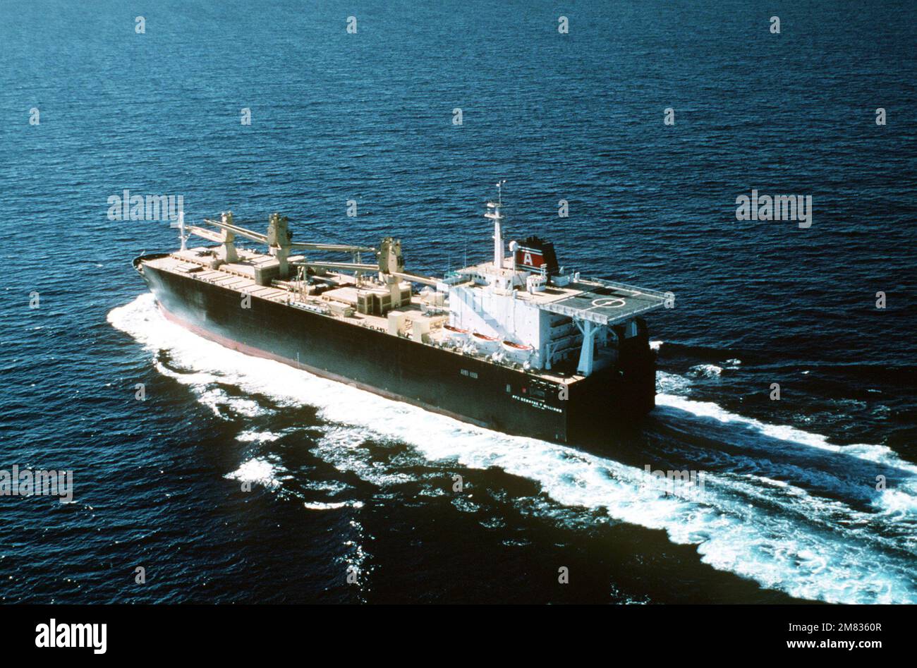 Aerial port quarter view of the maritime prepositioning ship USNS PFC ...
