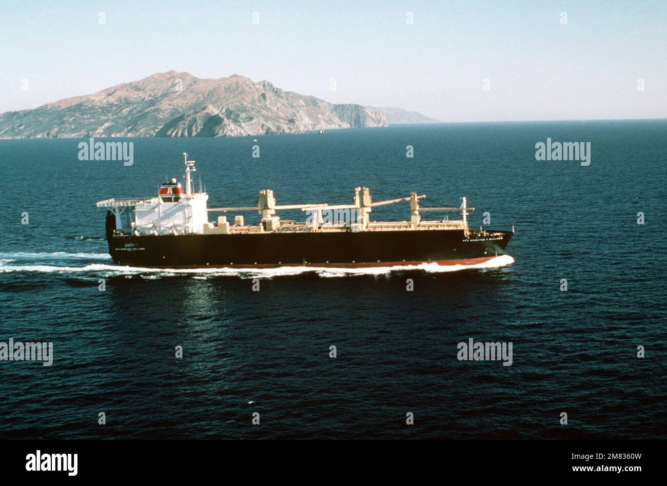 Aerial starboard beam view of the maritime prepositioning ship USNS PFC ...