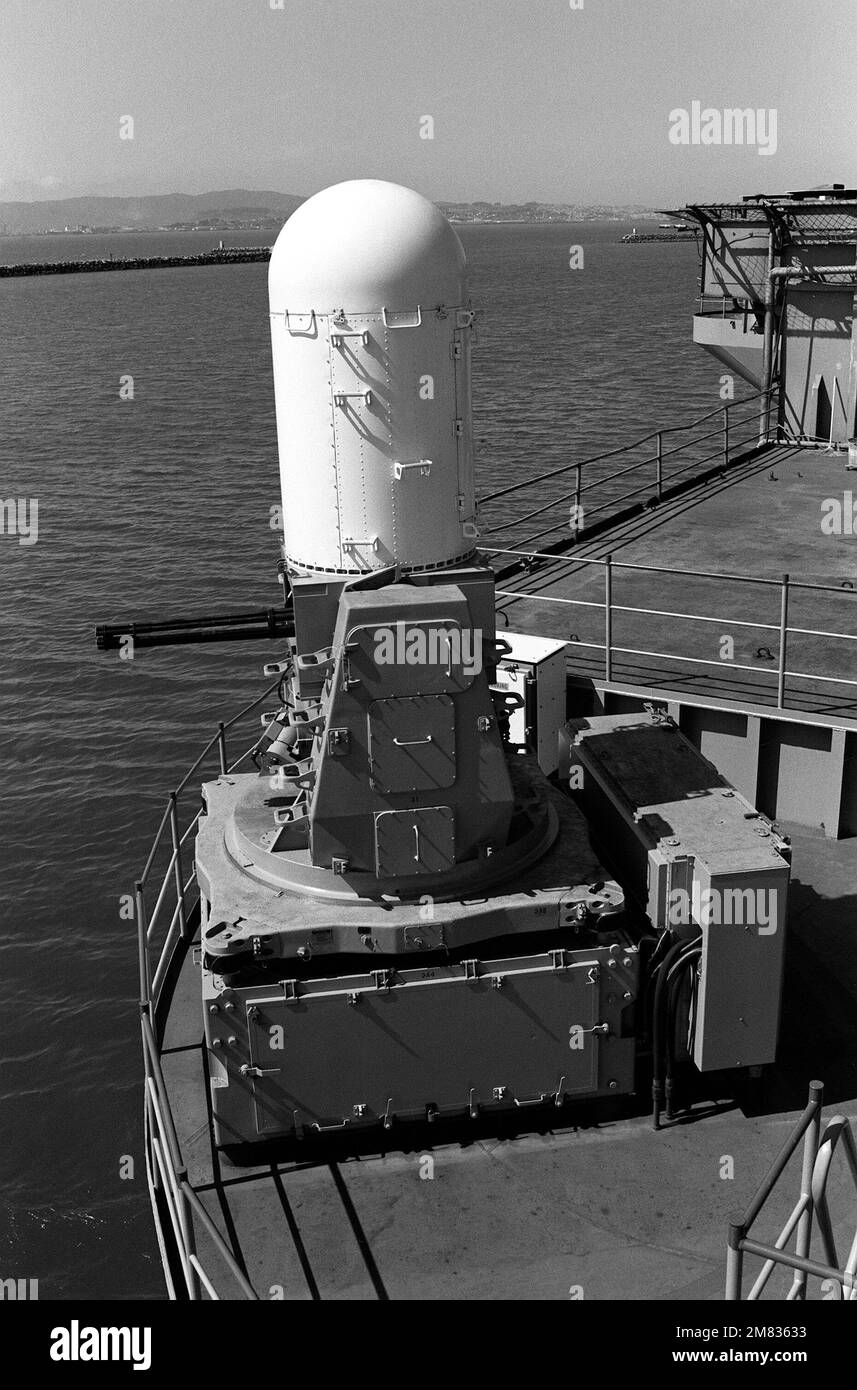 A Mark-16 Phalanx close-in weapon system mounted on the port quarter of ...