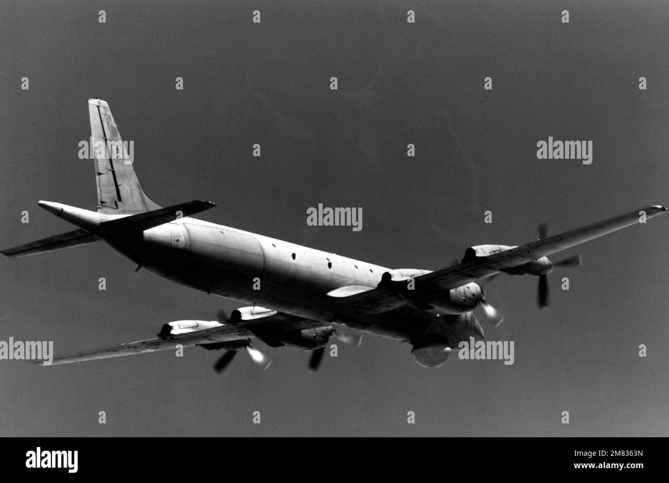Air-to-air right underside view of a Soviet I1-38 May aircraft. Country ...
