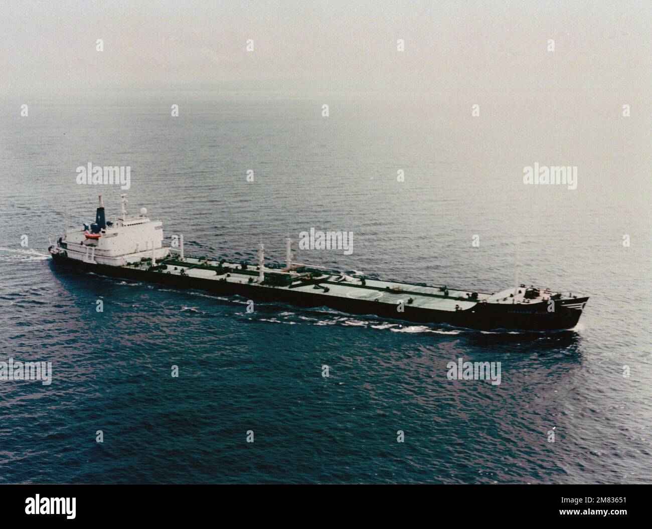 An elevated starboard bow view of the transport oiler USNS OVERSEAS ...