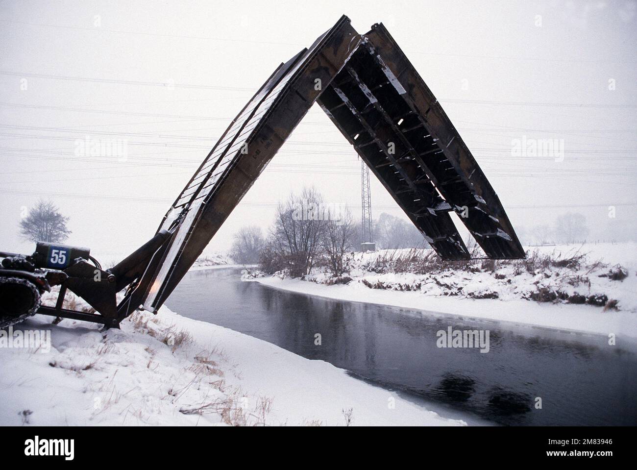 An M-60 armored vehicle launched bridge is deployed across the Lahn ...
