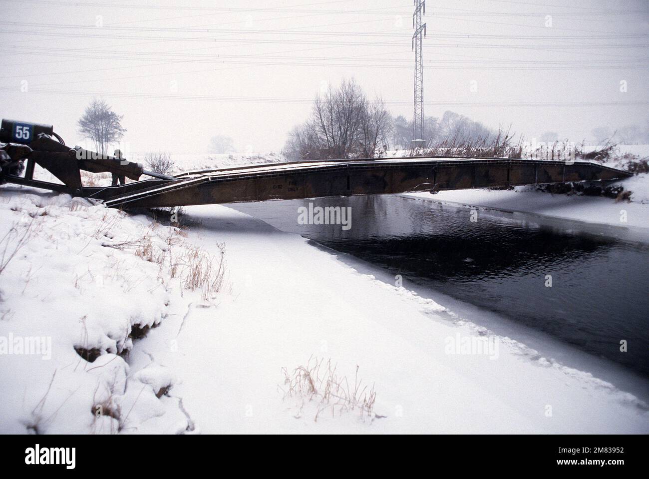 An M-60 armored vehicle launched bridge is deployed across the Lahn ...