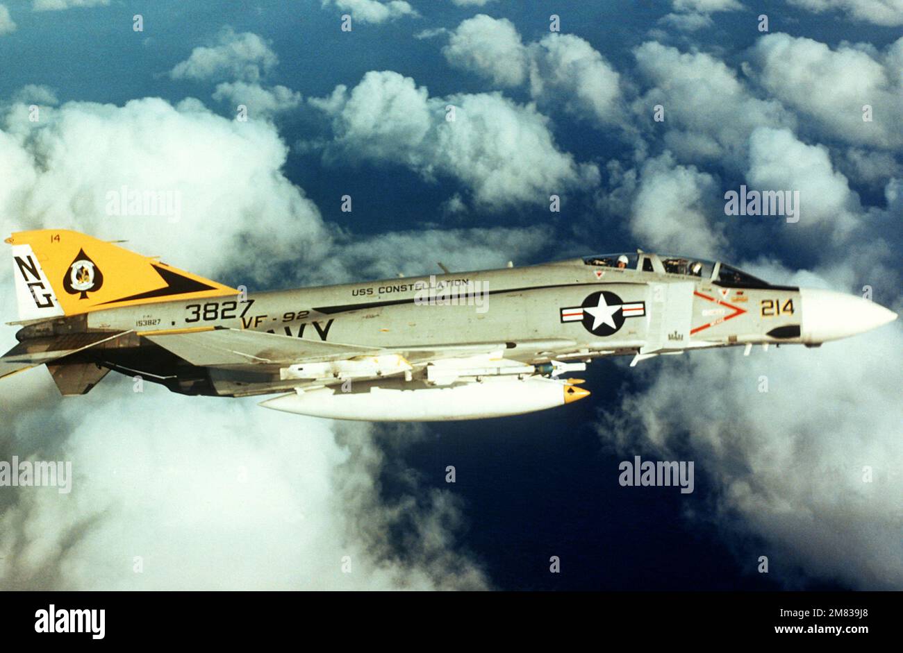 An air-to-air right side view of a Fighter Squadron 92 (VF-92) F-4J ...
