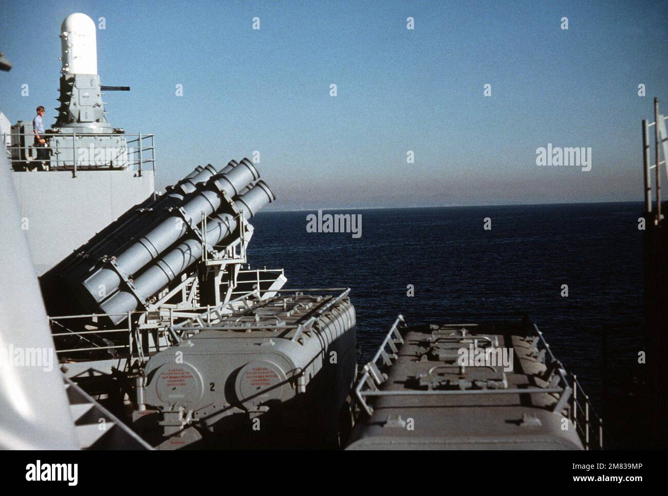 Weapons aboard the battleship USS NEW JERSEY (BB-62) include, from left ...
