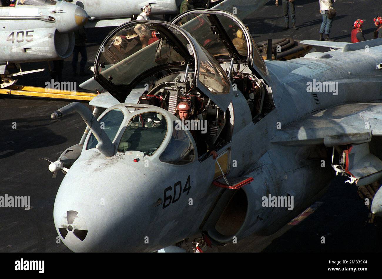 An aviation electronics technician inspects the cockpit of an EA-6B ...