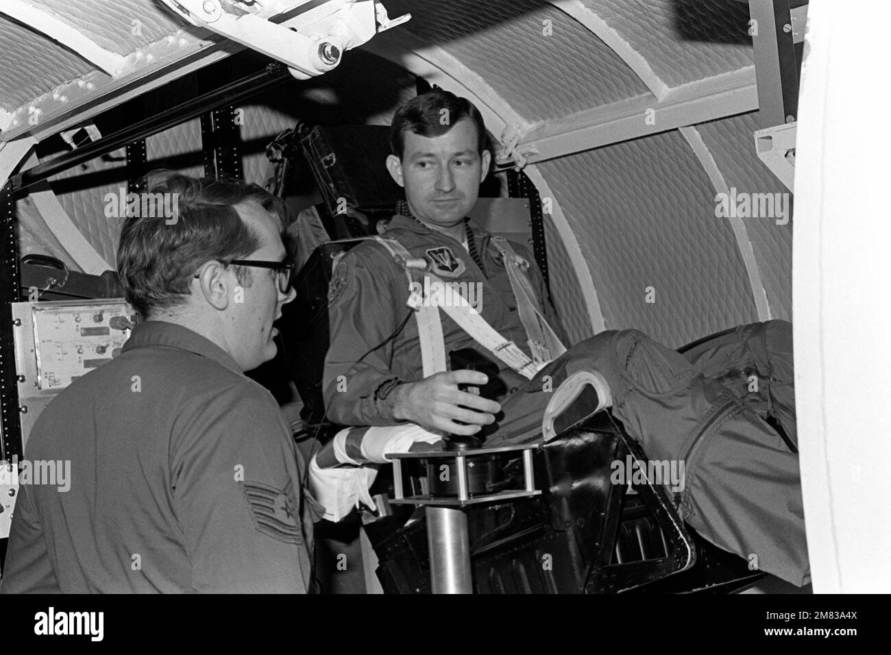 A Tactical Air Command pilot prepares for a stress test in a centrifuge ...