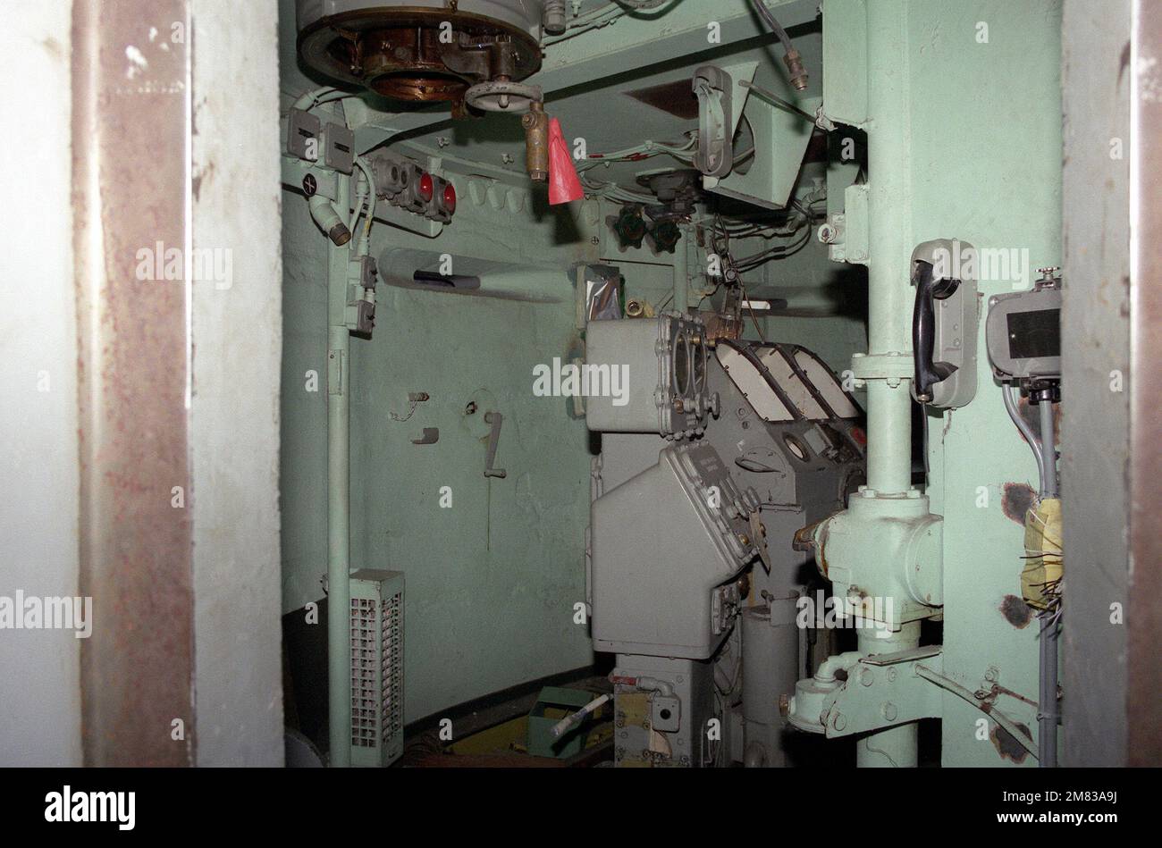 A view of the port side of the combat bridge and control console aboard ...