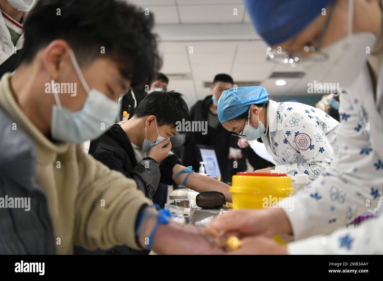 FUYANG, CHINA - JANUARY 12, 2023 - 200 college graduates take part in a ...