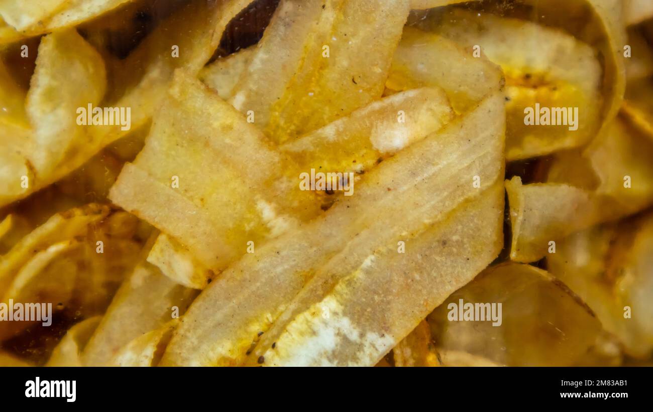 pile of delicious chips in the background Stock Photo - Alamy