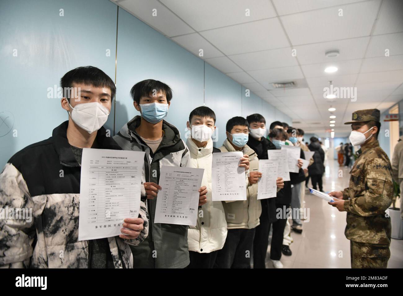 FUYANG, CHINA - JANUARY 12, 2023 - 200 college graduates take part in a ...