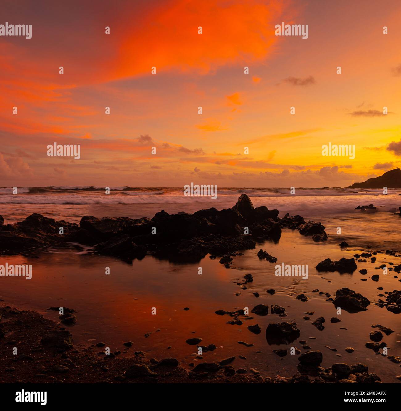 Reflection In Tide Pool at Koki Beach With Alau Island in The Distance ...