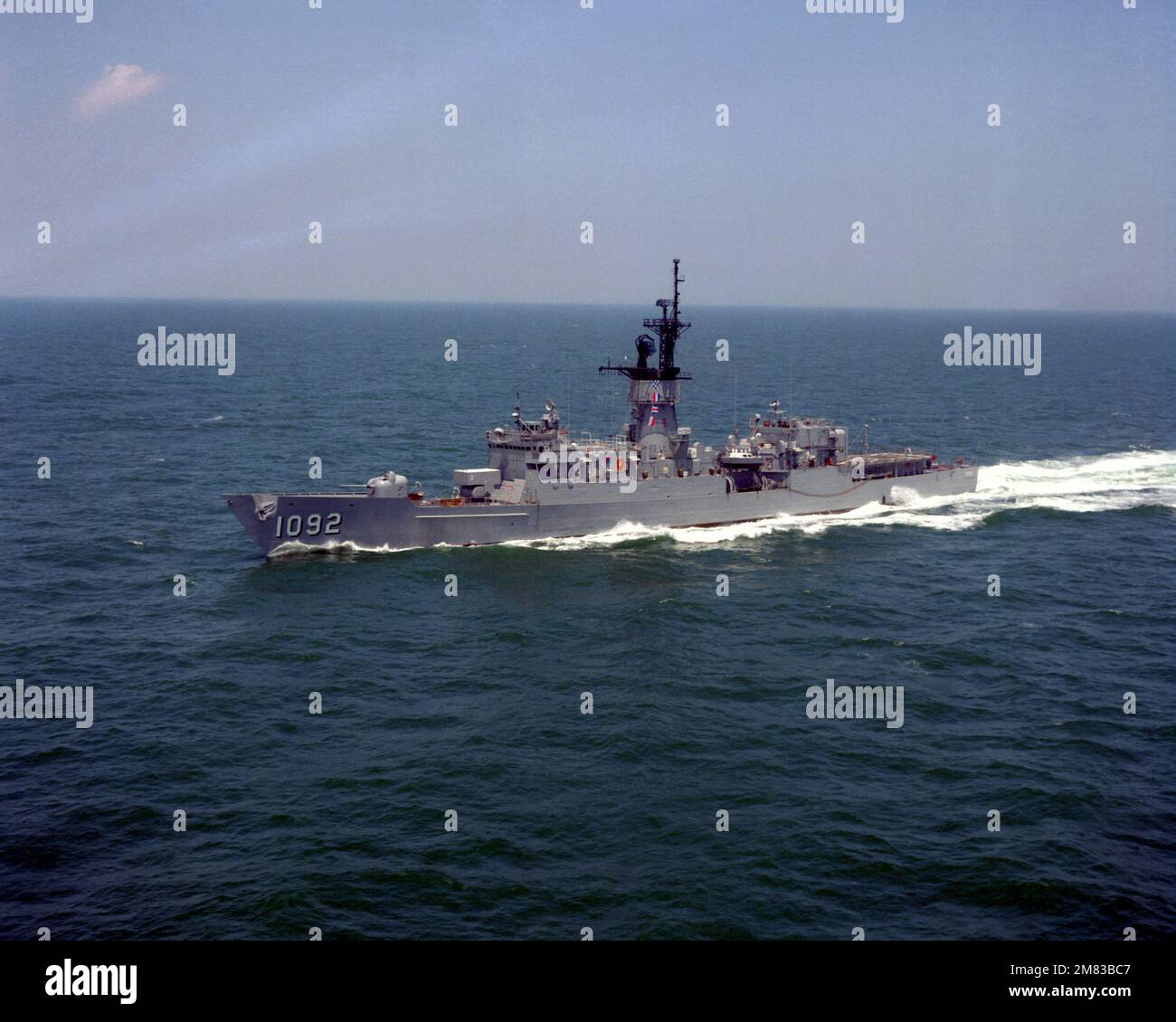 A port bow view of the frigate USS THOMAS C. HART (FF-1092) underway ...