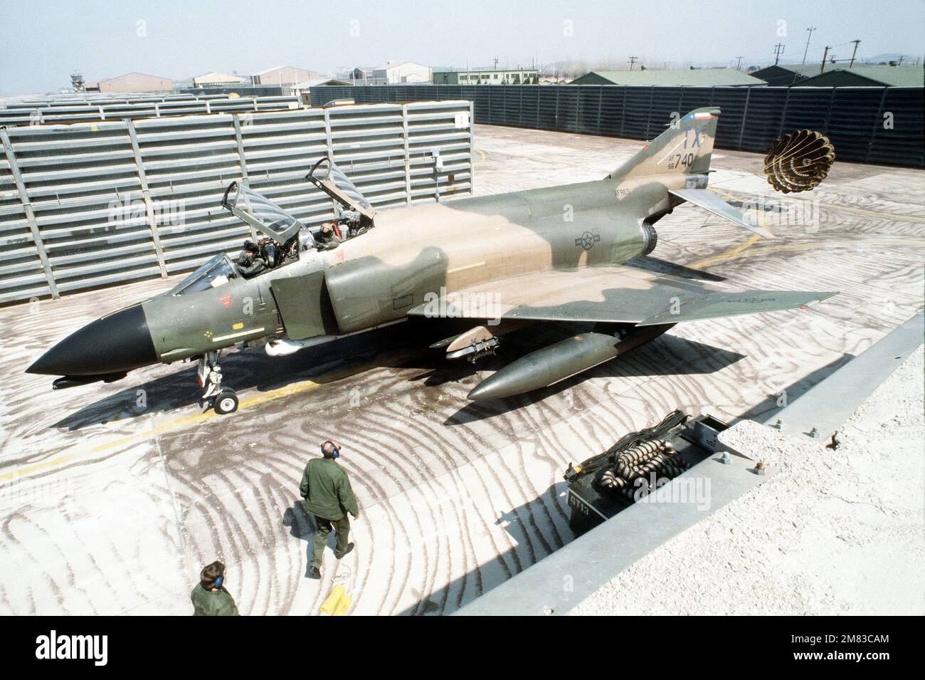 A 924th Tactical Fighter Wing F-4D Phantom II aircraft trails its drag ...