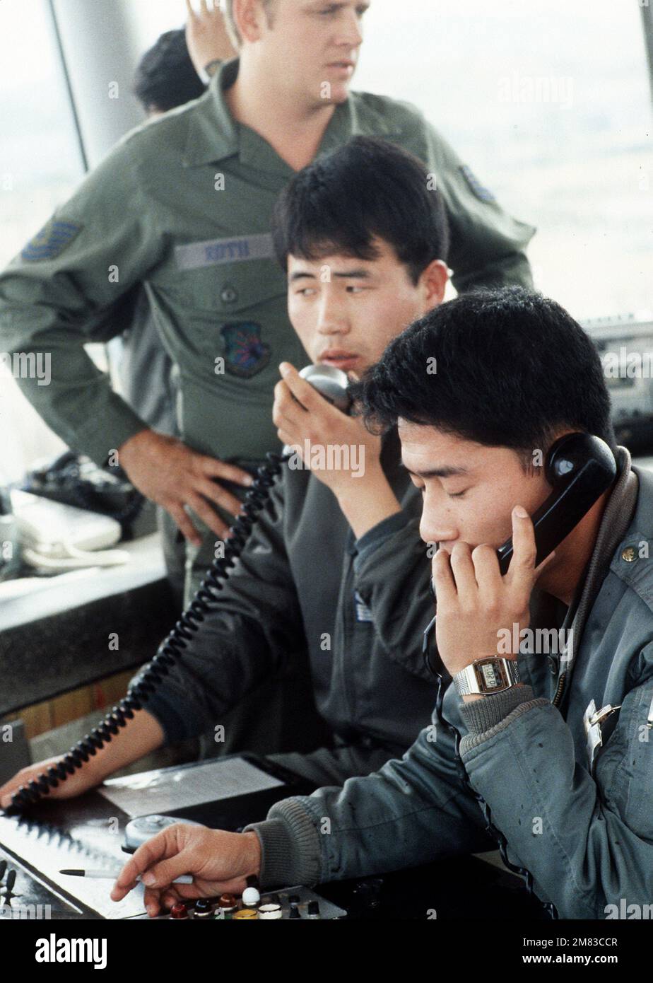 Korean air force air traffic controllers direct air traffic from the ...