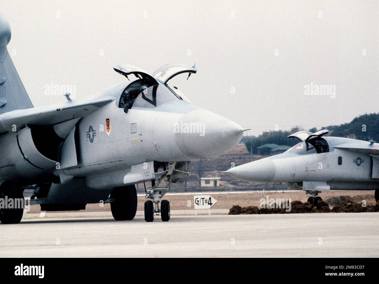 Two 366th Tactical Fighter Wing EF-111 Raven aircraft taxi on the ...