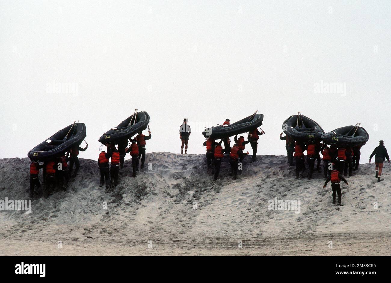 A U.S. Navy Basic Underwater Demolition/Sea-Air-Land (SEAL) (BUD/S ...
