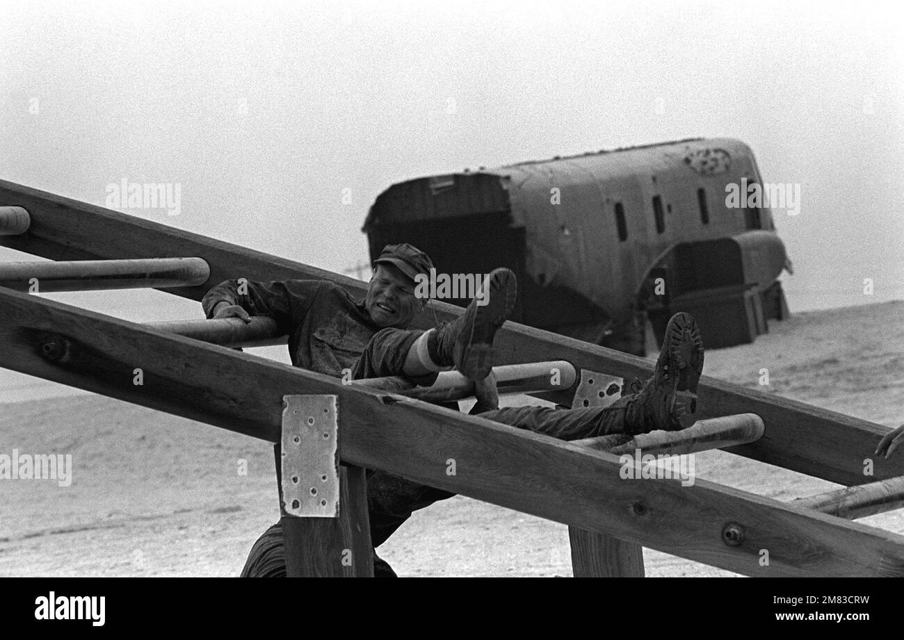 A U.S. Navy Basic Underwater Demolition/Sea-Air-Land (SEAL) (BUD/S ...