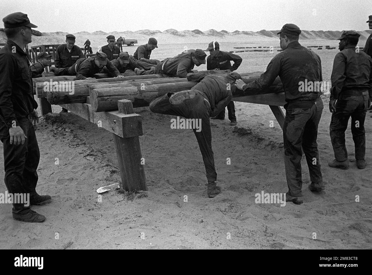 A U.S. Navy Basic Underwater Demolition/Sea-Air-Land (SEAL) (BUD/S ...