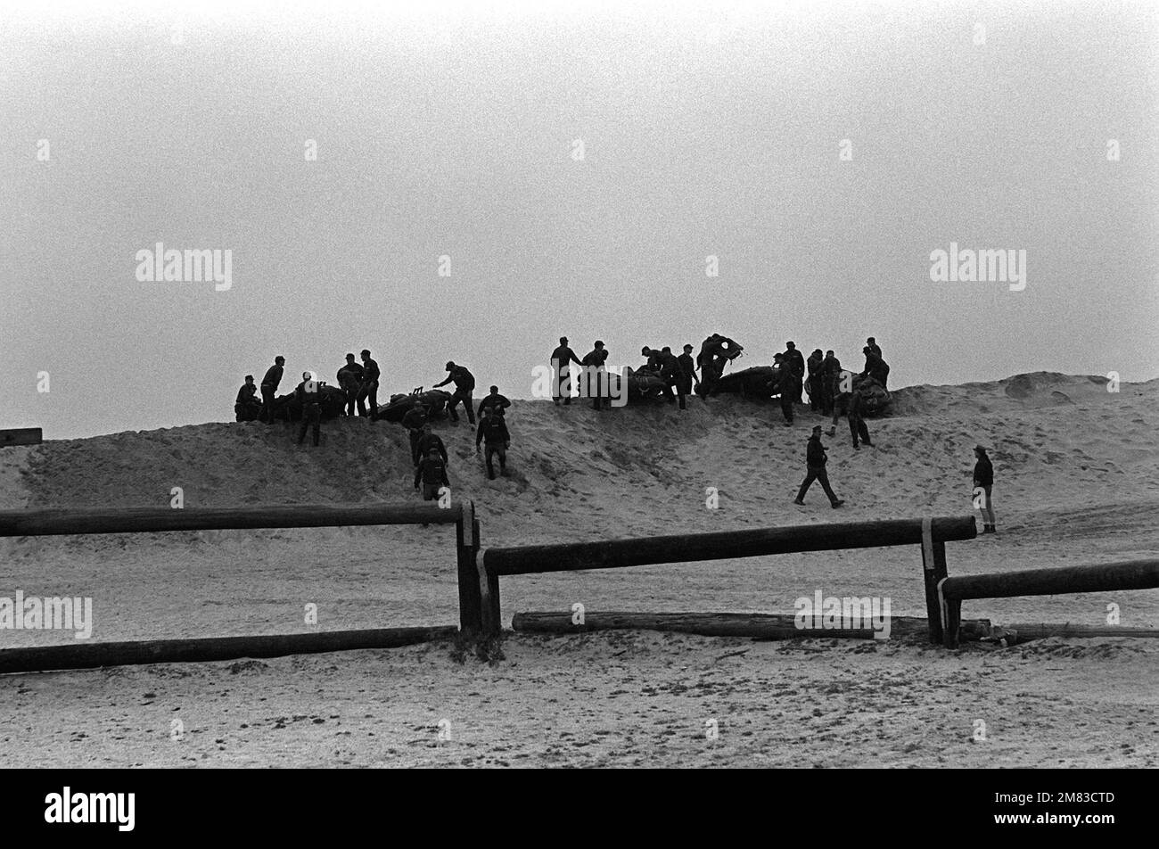 A U.S. Navy Basic Underwater Demolition/Sea-Air-Land (SEAL) (BUD/S ...