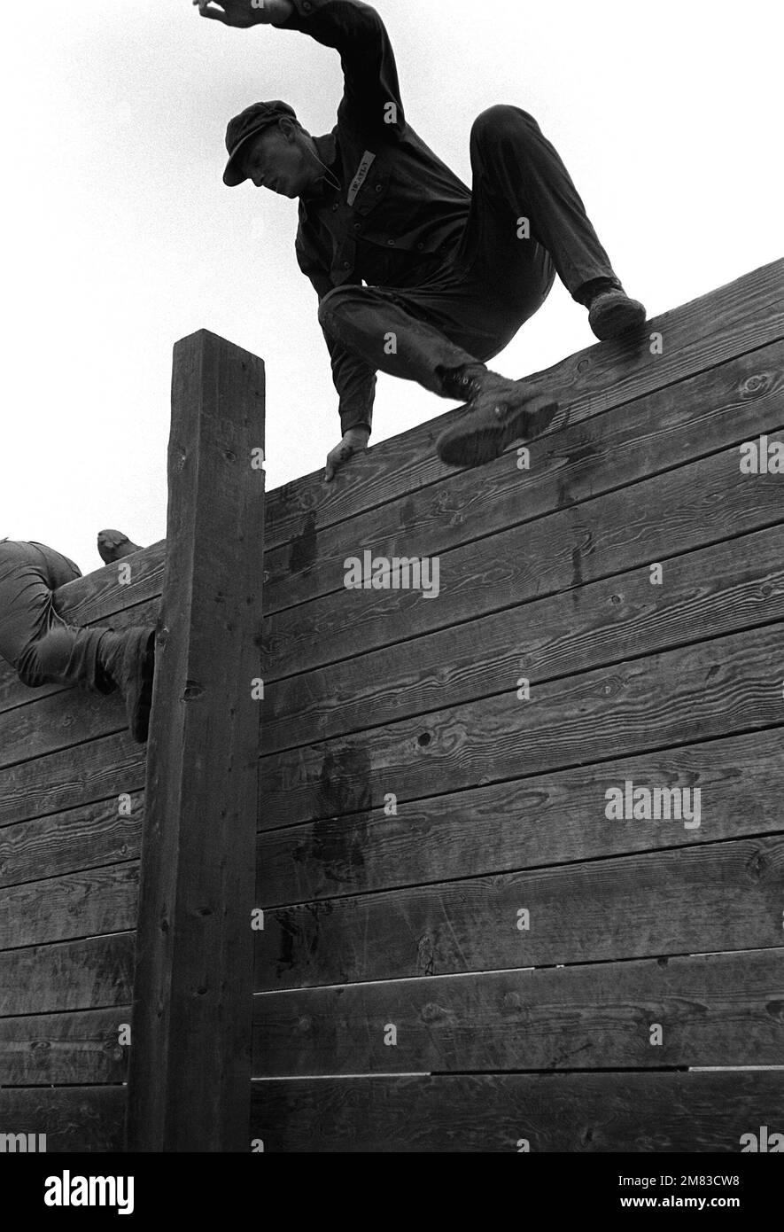 A U.S. Navy Basic Underwater Demolition/Sea-Air-Land (SEAL) (BUD/S ...