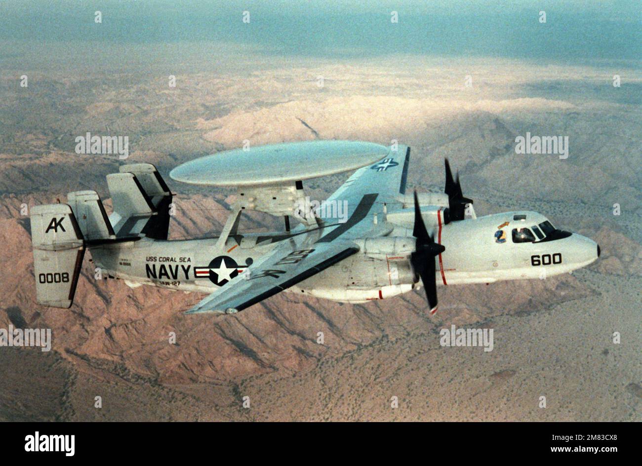 An air-to-air right side view of an Airborne Early Warning Squadron 127 ...