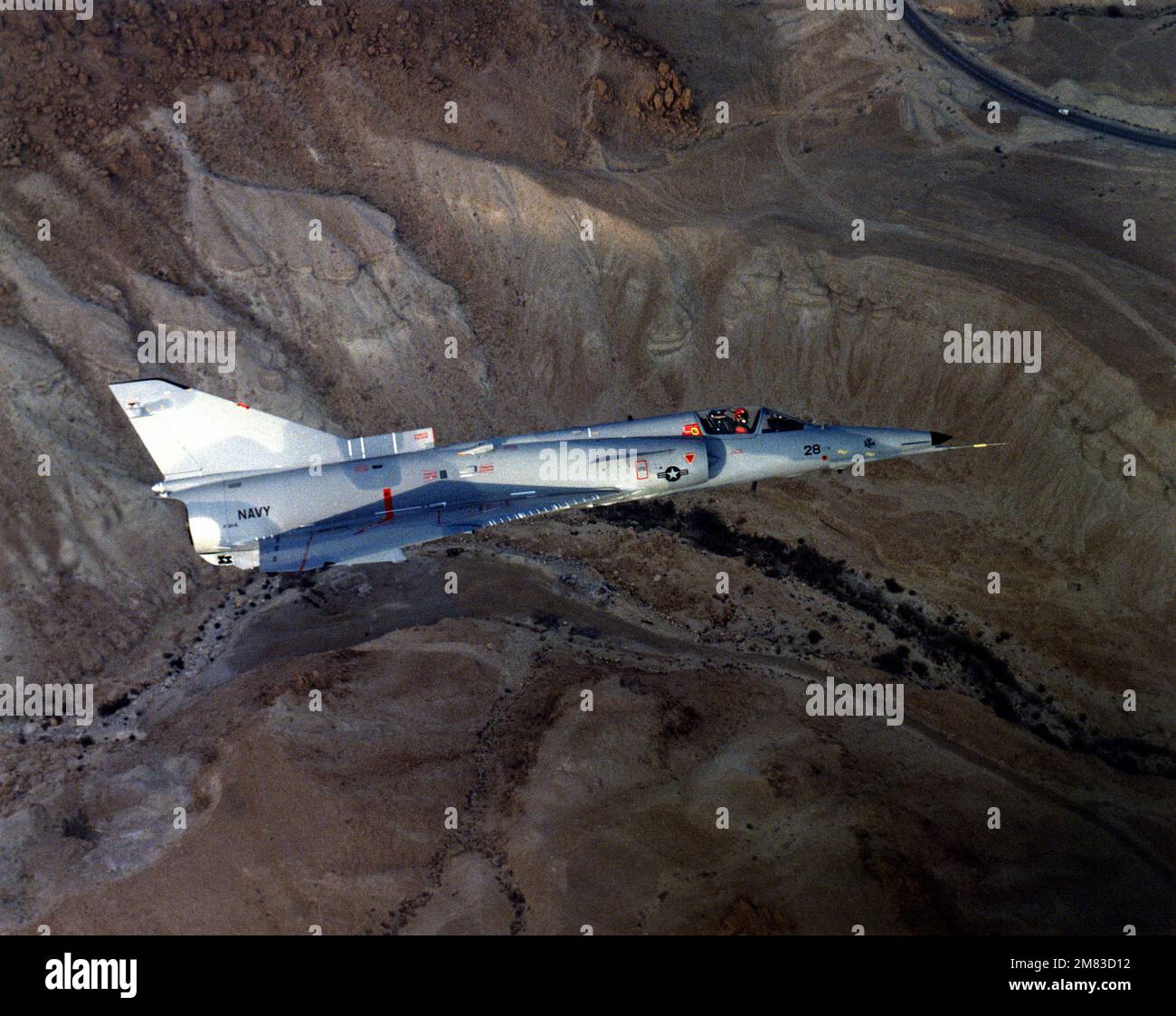 An air-to-air right side view of an F-21A Kfir (young lion) aircraft ...