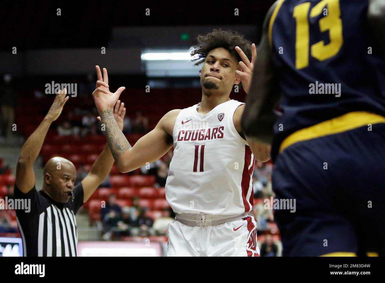 Washington State forward DJ Rodman (11) celebrates his basket during ...