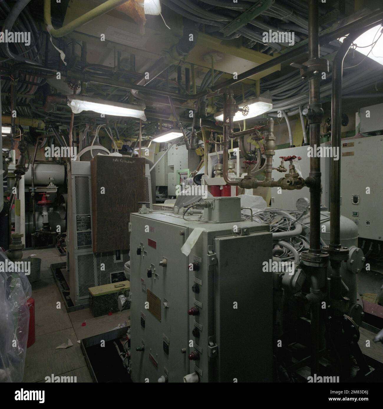 A view of auxiliary machinery room No. 3 aboard the guided missile ...