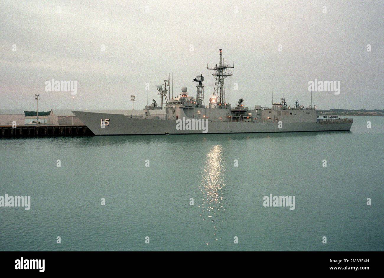 A port bow view of the guided missile frigate USS ESTOCIN (FFG-15) in ...