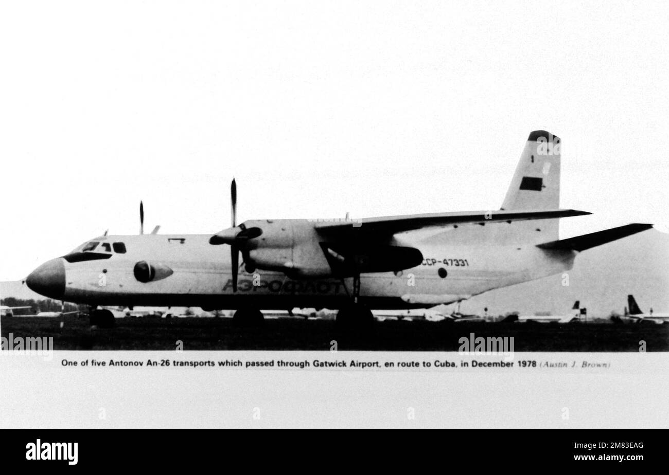 A left side view of a Soviet An-26 Curl transport aircraft. Country ...