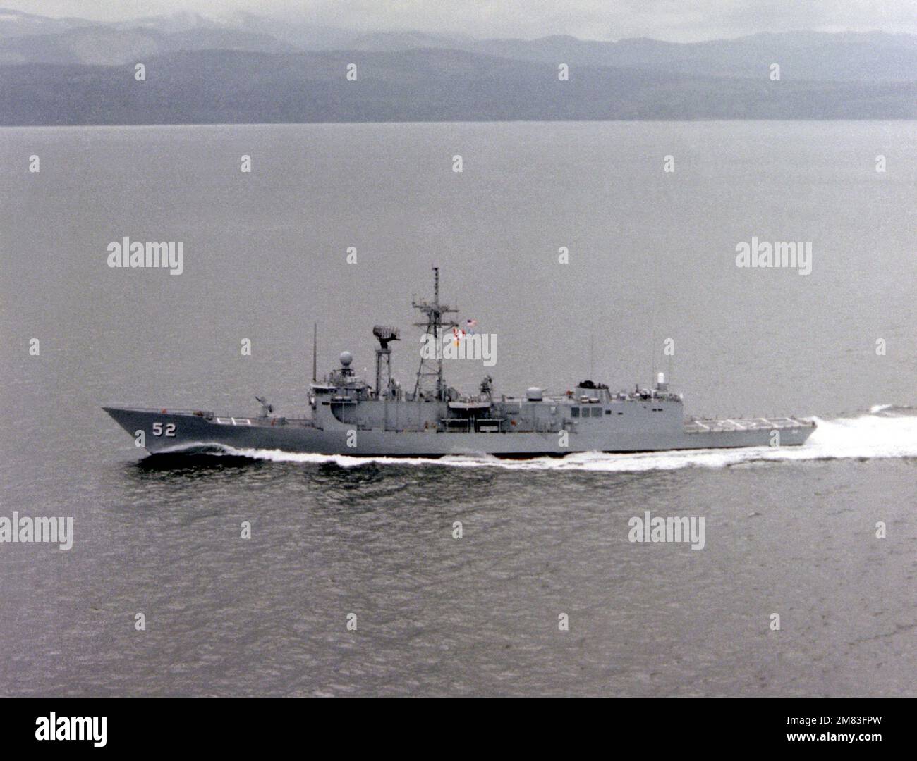 Aerial port beam view of the Oliver Hazard Perry class guided missile ...