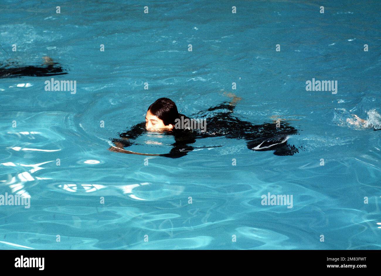 Women Marine recruits participate in swimming qualifications during ...