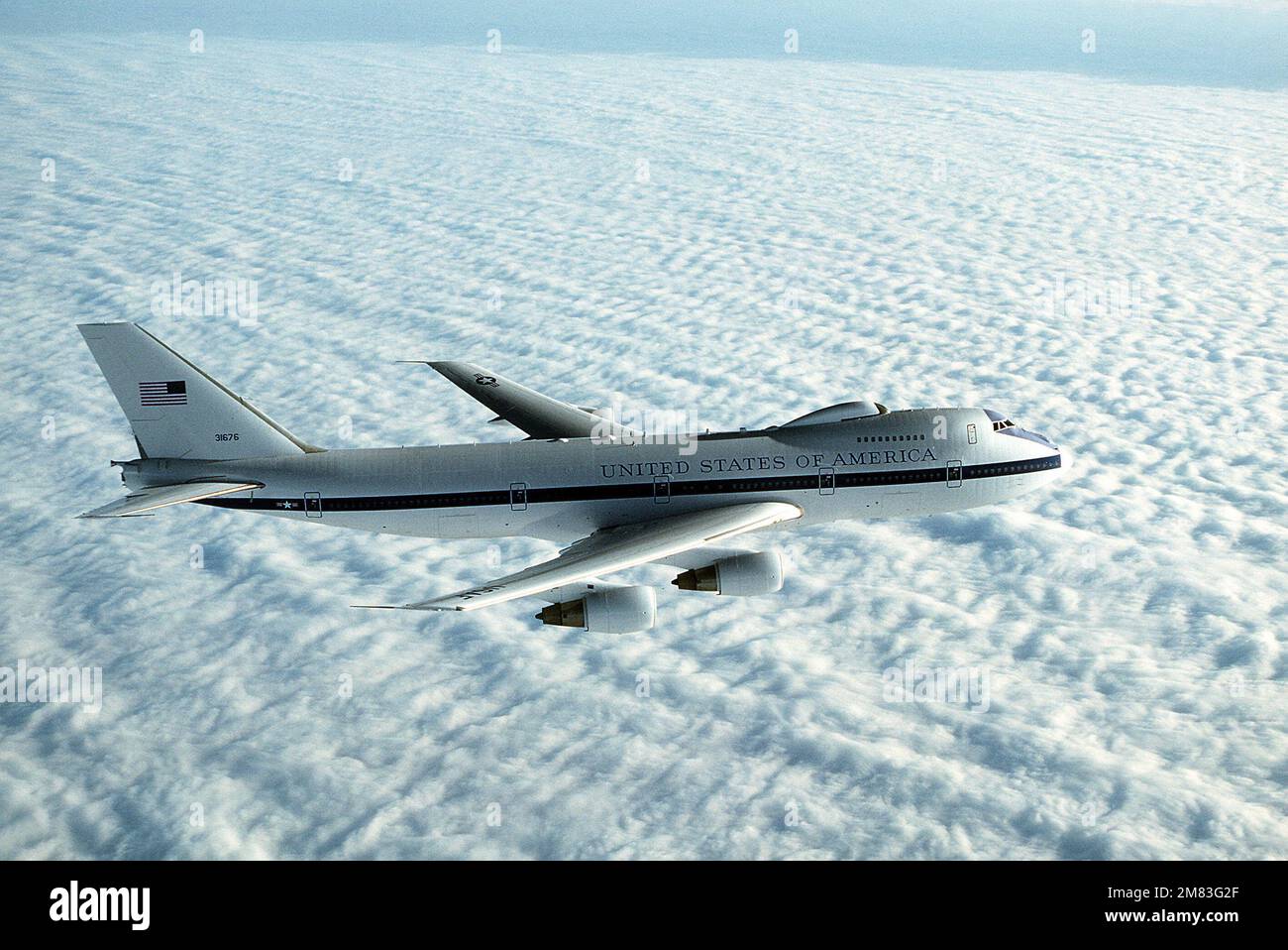 An air-to-air right side view of an E-4B Advanced Airborne Command Post ...