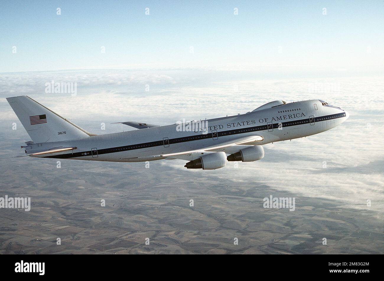 An air-to-air right side view of an E-4B Advanced Airborne Command Post ...